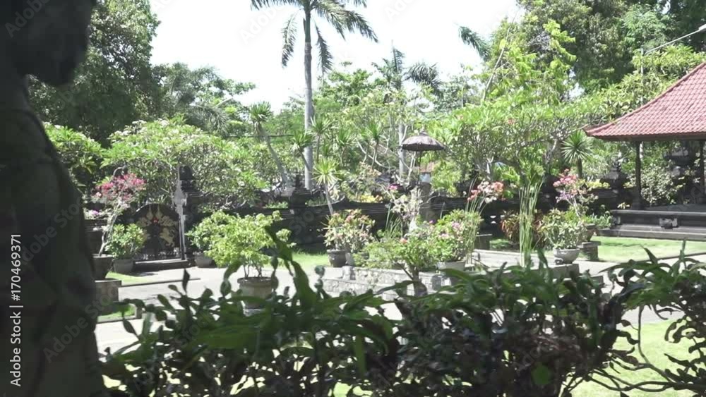 Pura Goa Lawah (bat cave temple). The temple is built surrounding a ...