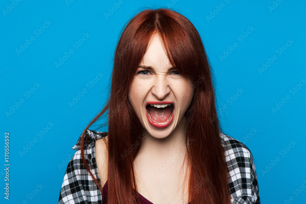 Angry screaming woman on pop blue backdrop. Rage emotion background ...