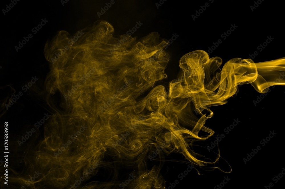 Gold smoke on black background,movement of gold smoke, Abstract gold ...