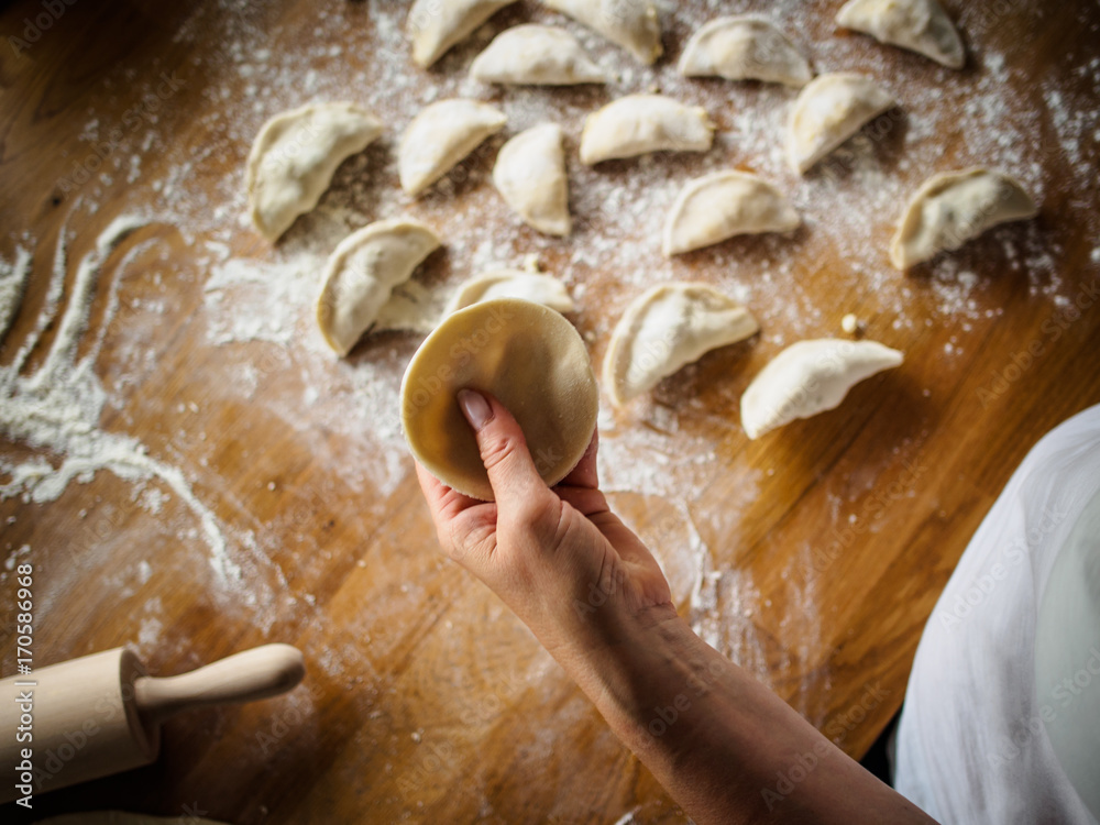 Making dumplings Stock Photo | Adobe Stock