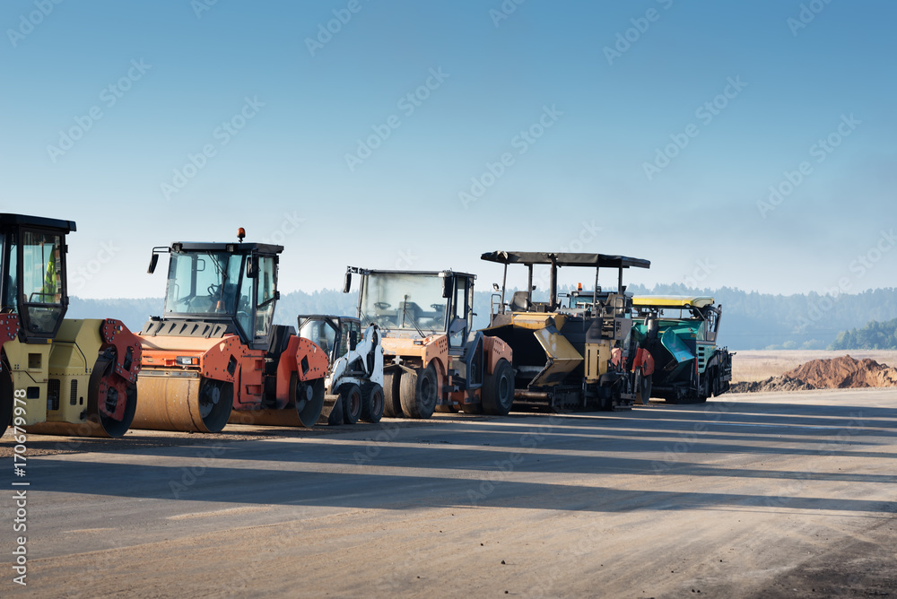 road under construction - wheel loader machine, pneumatic tyred roller ...
