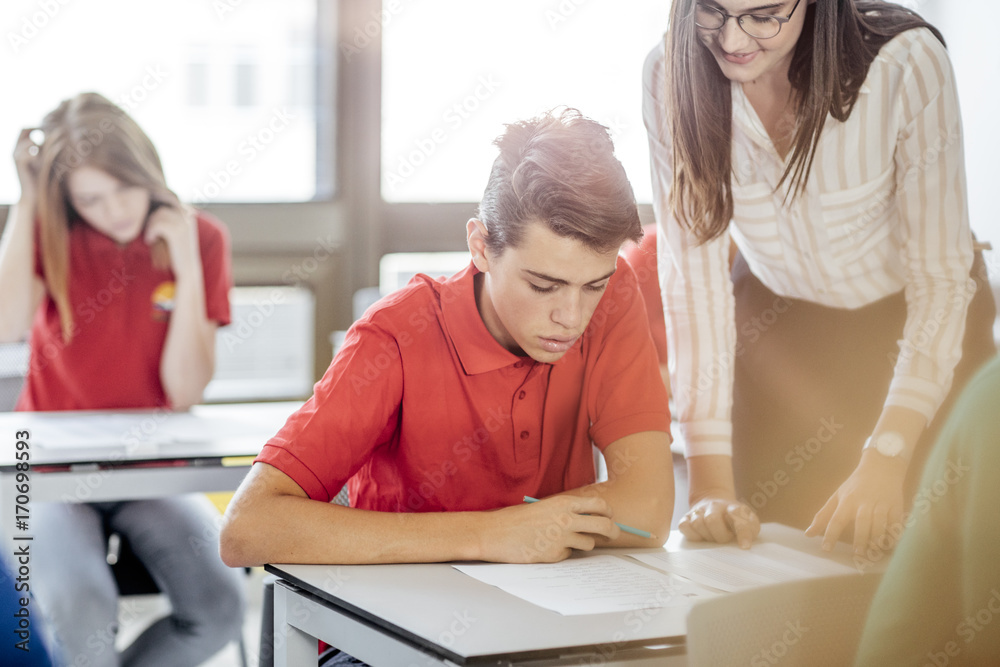 Professor Helping to Sudent Stock Photo | Adobe Stock