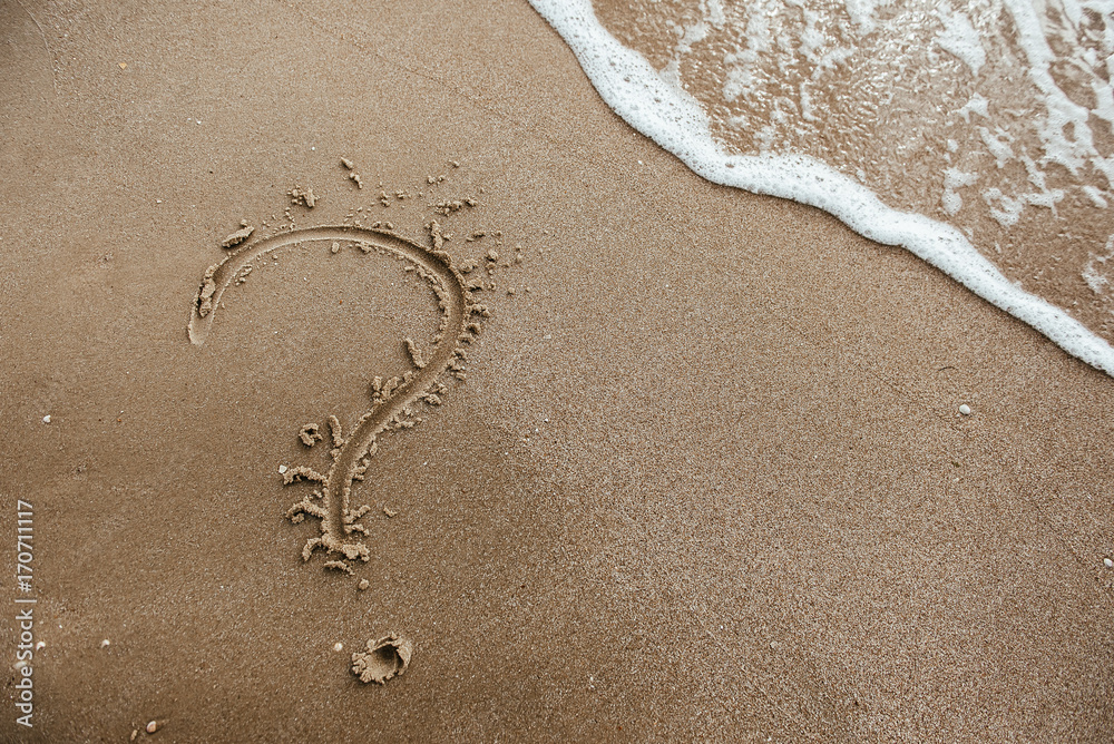 question mark sign in sand beach Stock Photo | Adobe Stock