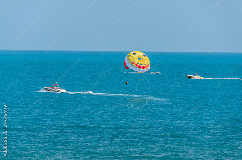 ALBENA, BULGARIA - JUNE 15, 2017: Colored parasail wing pulled by a ...