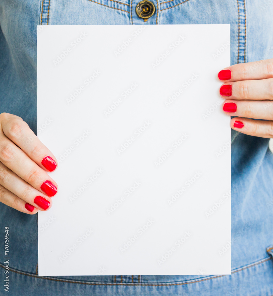 Woman, girl holds blank white paper. Mockup of the Leaflet ...
