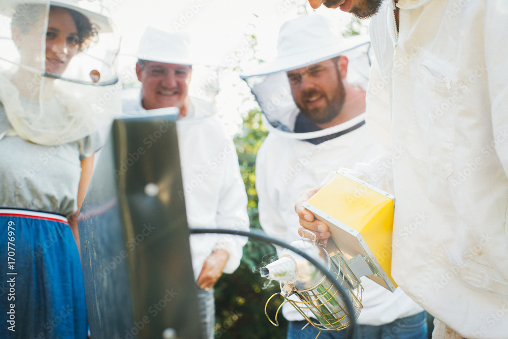 Apiculture Workshop - Apiarist Explaining to Students How To Use Bee ...