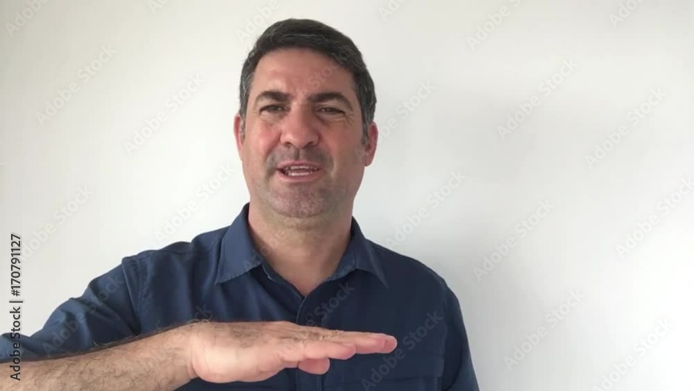 Italian man demonstrate I do not like you sign of Italian hand gestures ...