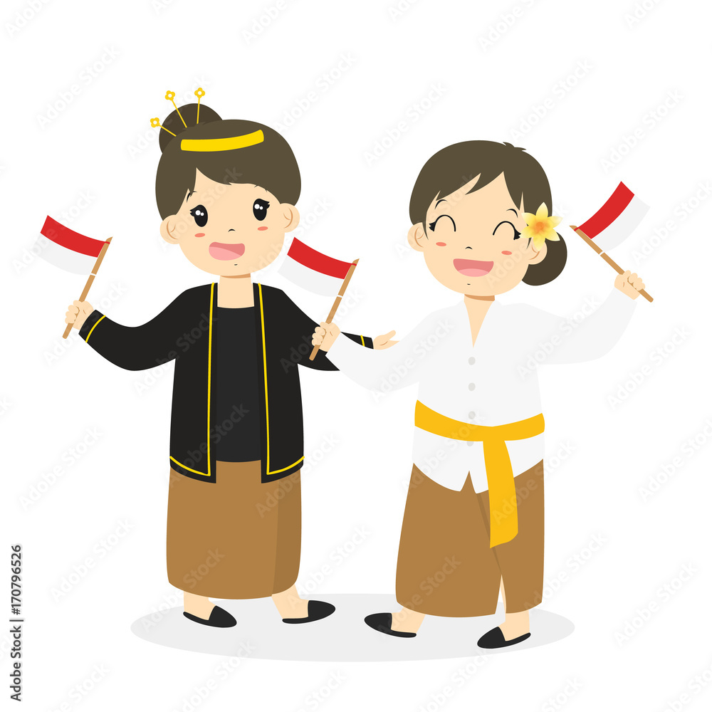 two happy girls in Javanese and Bali traditional dress holding ...