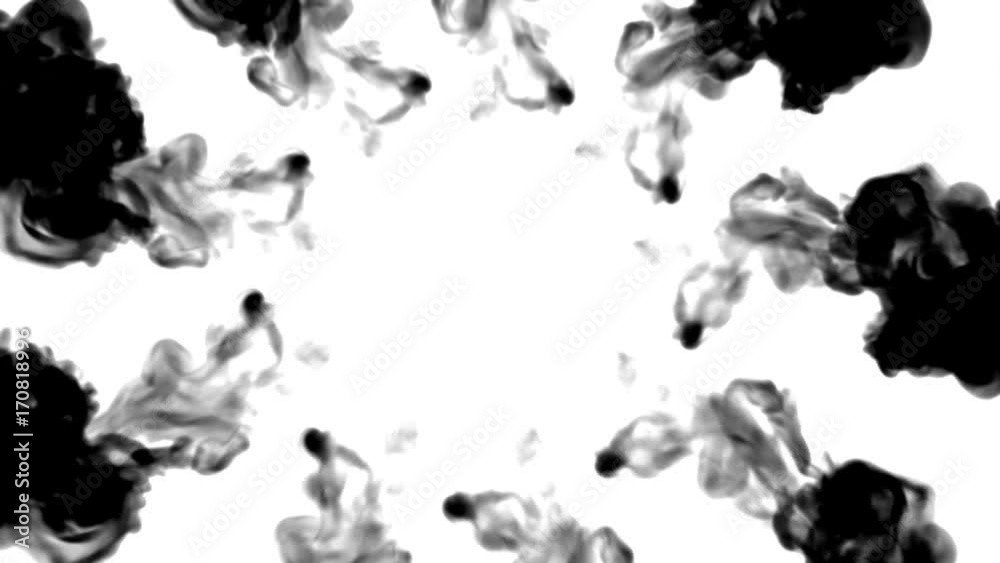 Overhead shot of black ink flows form star, ink inject or blow smoke on ...