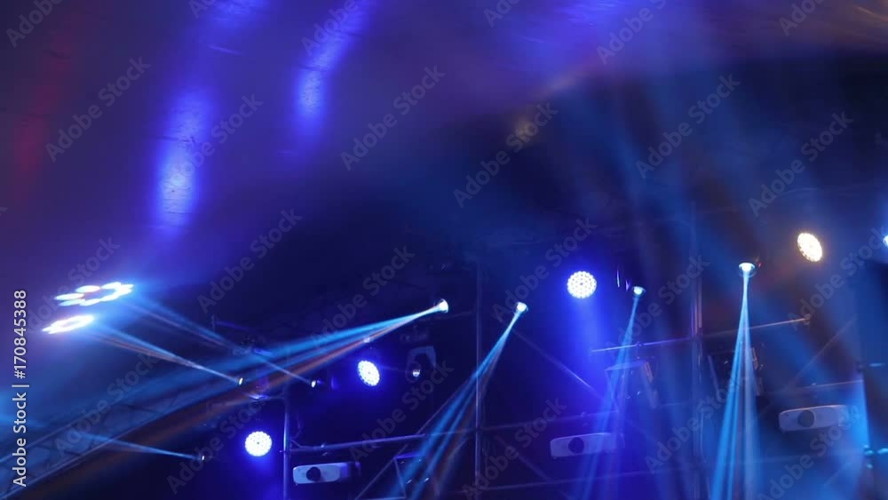Stage lights at the concert with fog, Stage lights on a console ...