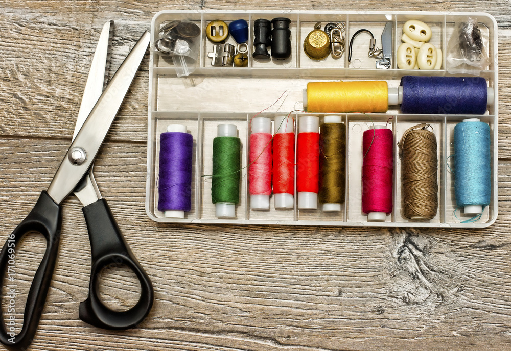 Sewing background: tailoring scissors,sewing toolbox and multicolor ...