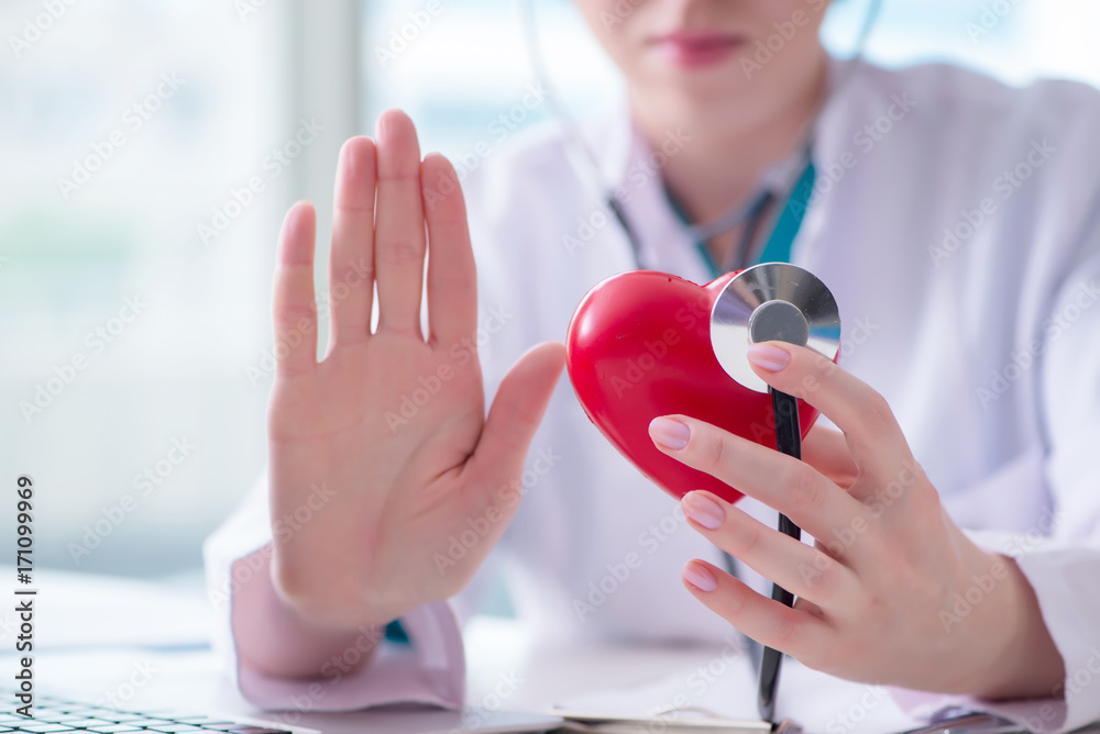 Doctor checking up heart in medical concept Stock Photo | Adobe Stock
