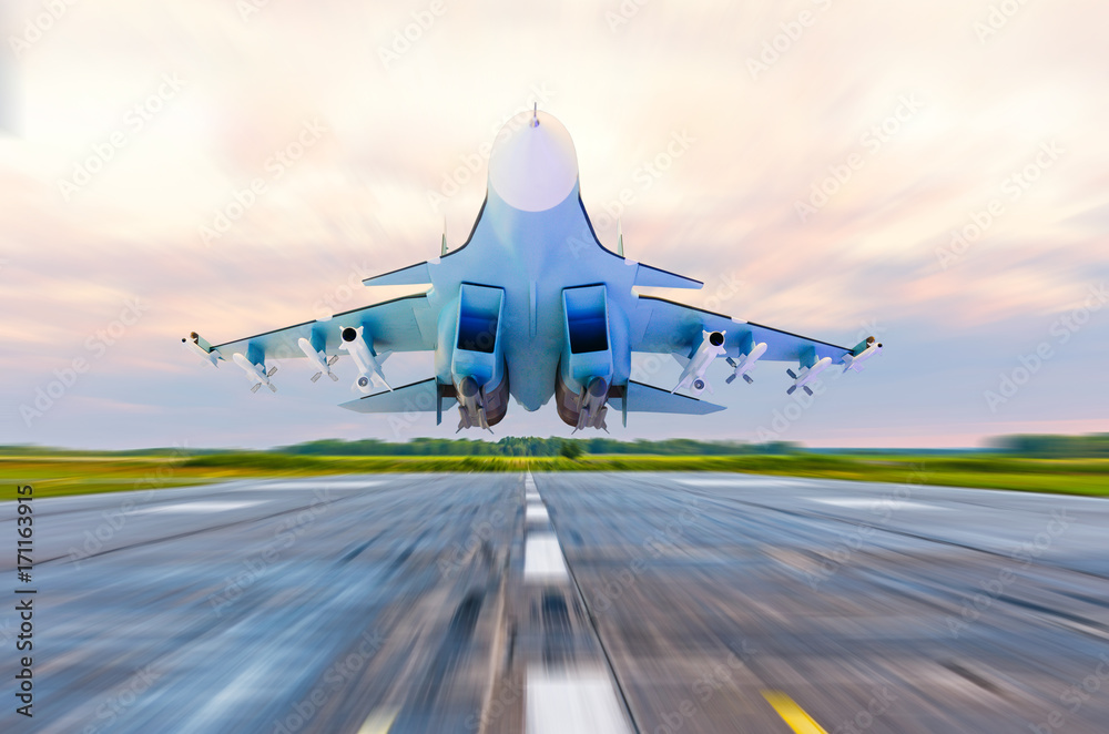 Military fighter jet flies at high speed over the taxiway at the ...