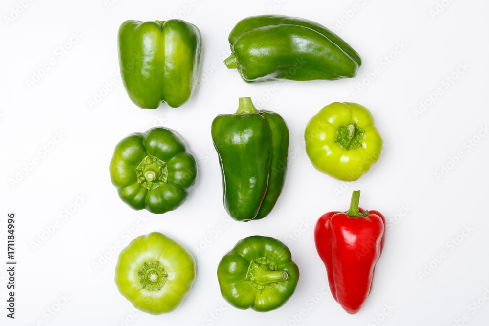 Top view of different kinds of peppers: green pepper, red paprika, on ...
