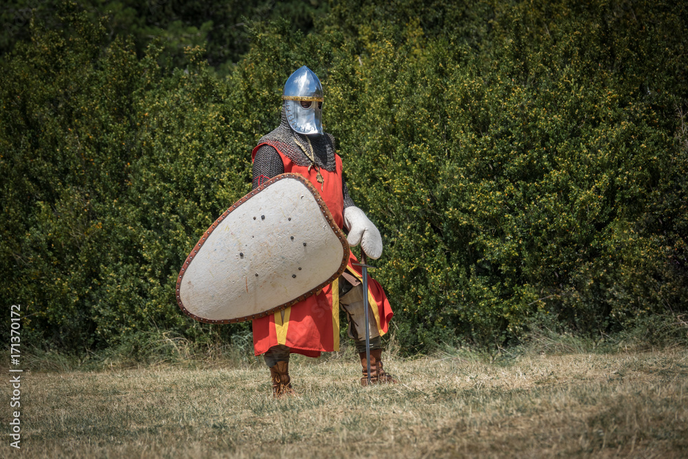 Medieval knight ready for battle, reenactment with costumed characters ...