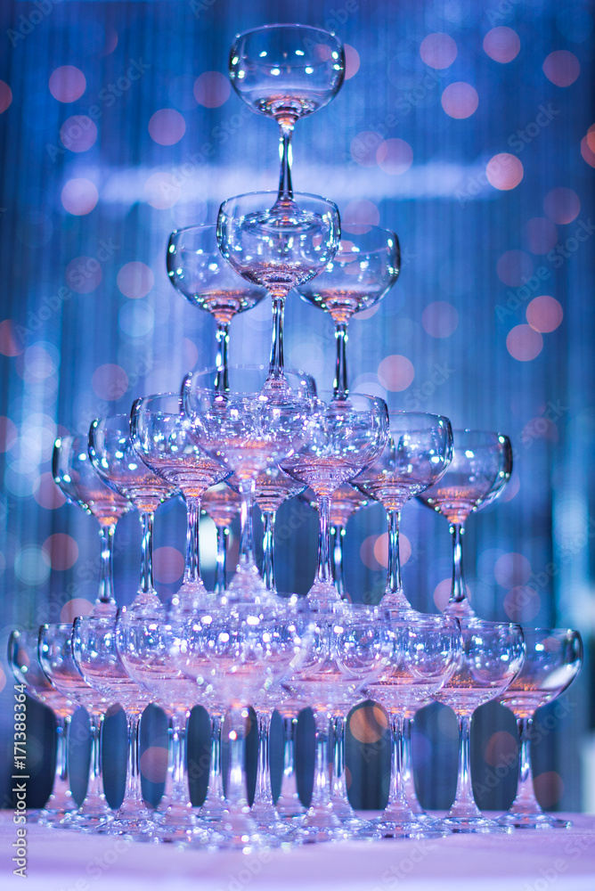 Pyramid of glasses champagne on wedding party. Champagne tower. Glass ...