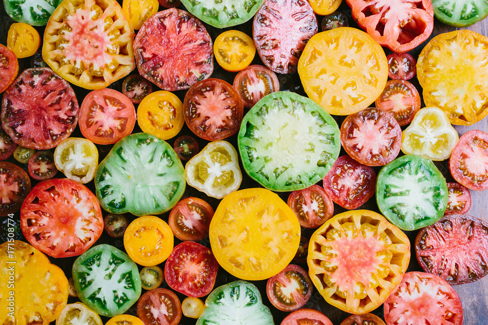 Multi colored heirloom tomatoes Stock Photo | Adobe Stock