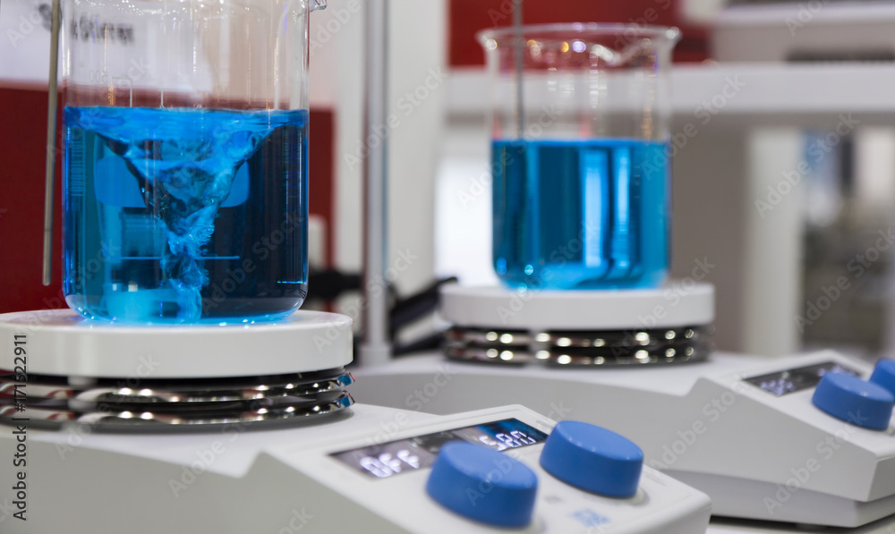 Beaker on magnetic stirrer Stock Photo | Adobe Stock