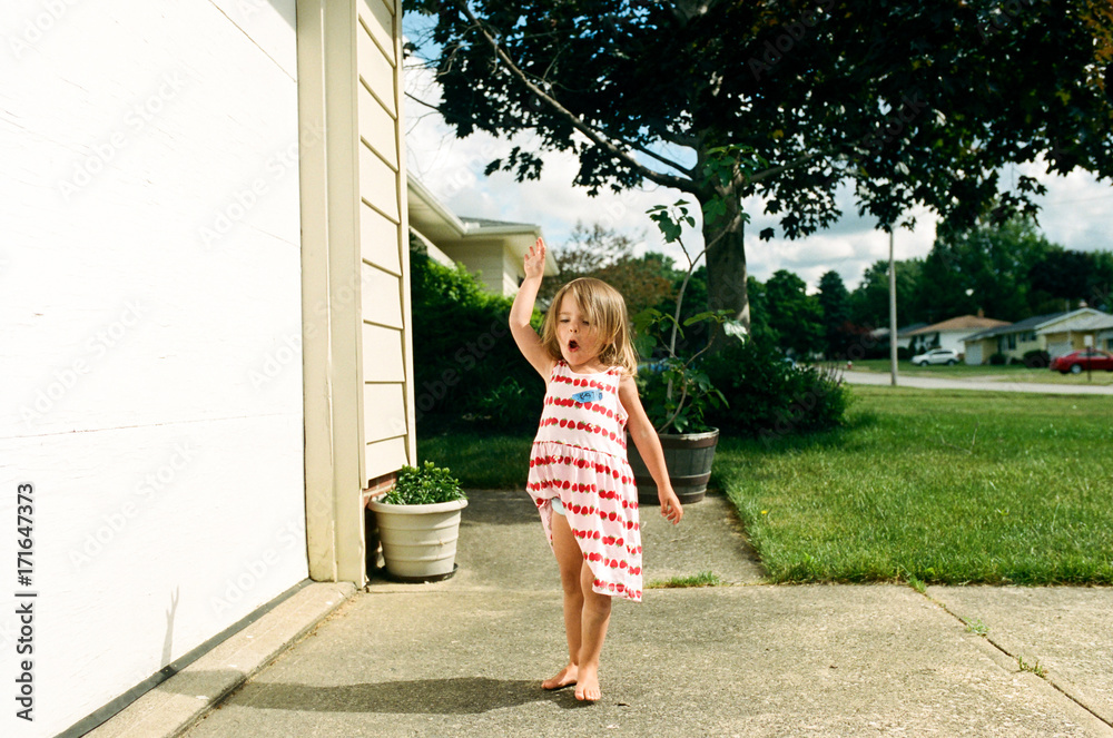 little girl dancing outside Stock Photo | Adobe Stock