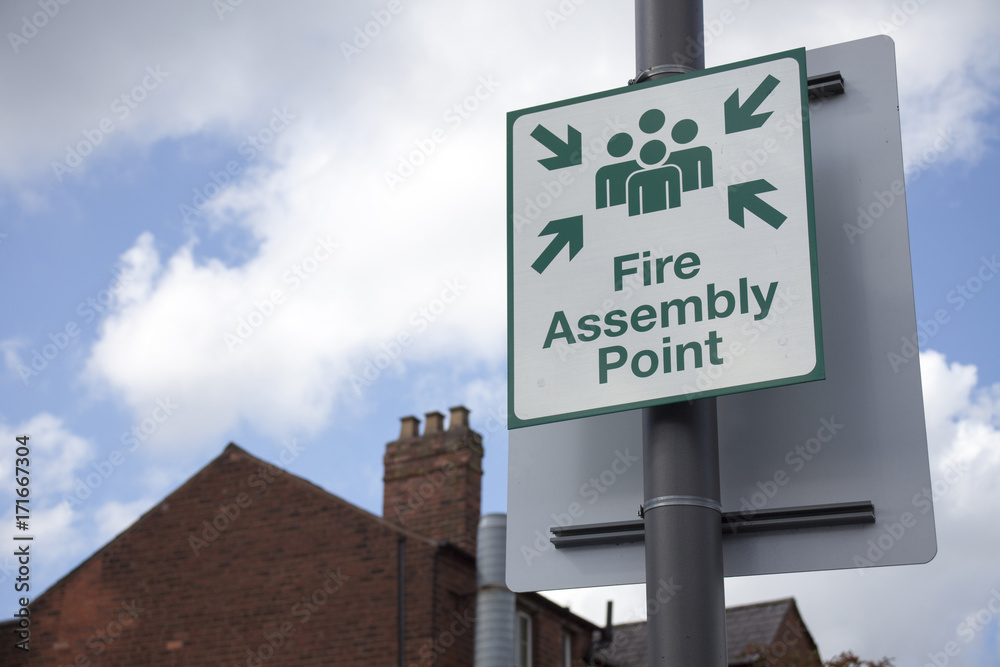 Sign fire assembly point on the street. Stock Photo | Adobe Stock