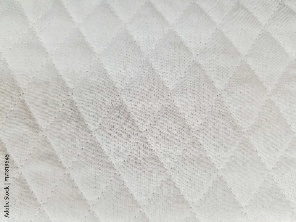 cream colored quilted fabric with pale grungy stain Stock Photo | Adobe ...