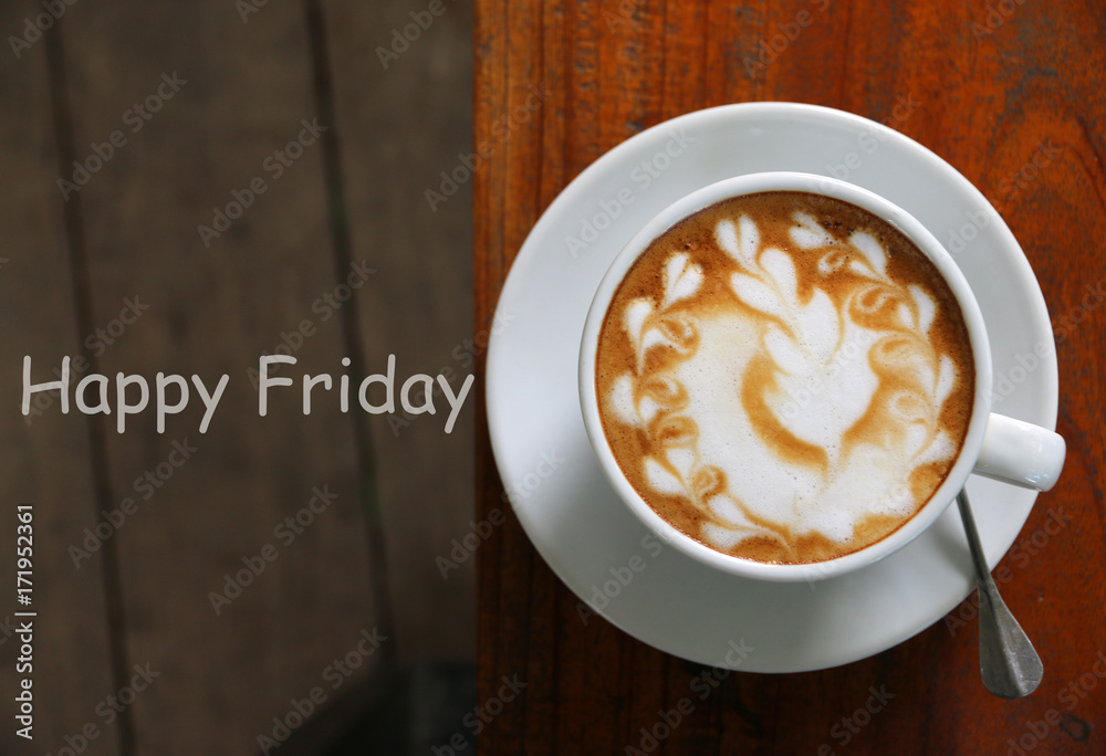Happy Friday text and hot coffee on the wood table in coffee shop cafe ...