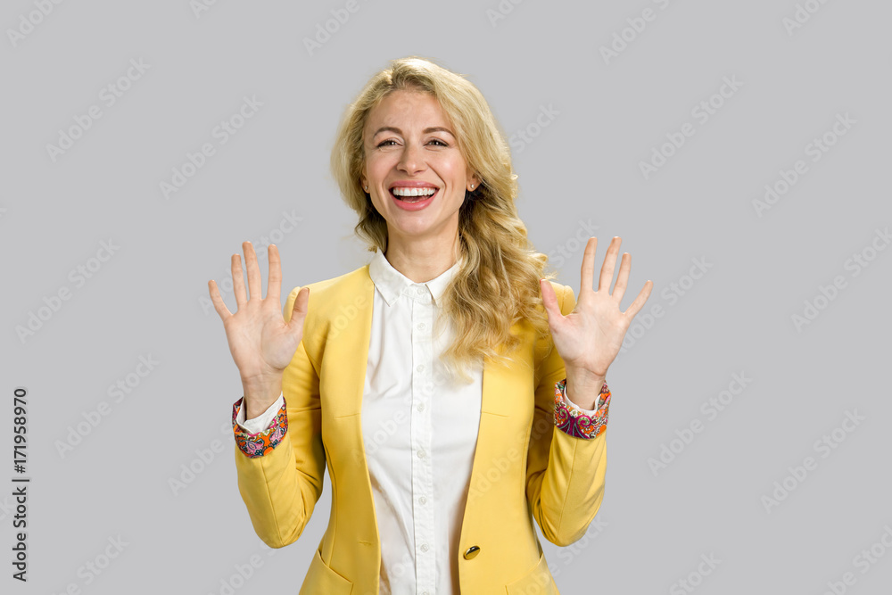 Joyful young woman gesturing stop. Happy smiling young business woman ...