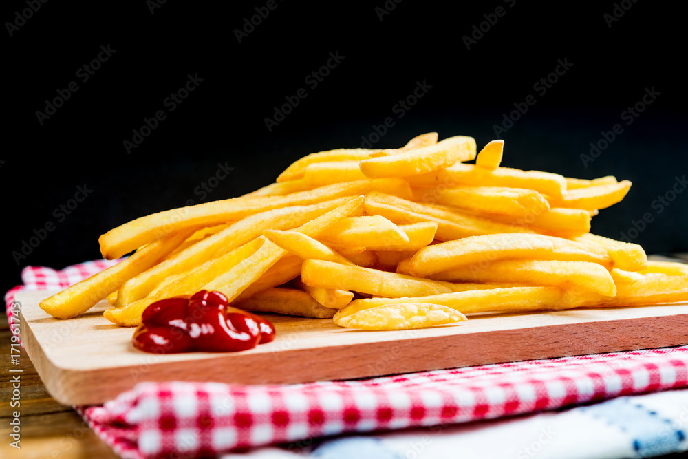 Golden French fries potatoes ready to be eaten Stock Photo | Adobe Stock
