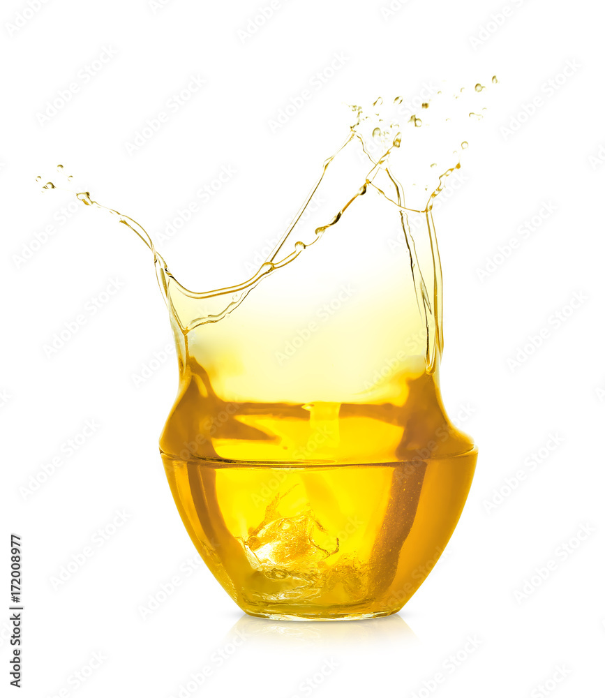 Cooking oil splashing from bowl, isolated on white Stock Photo | Adobe ...