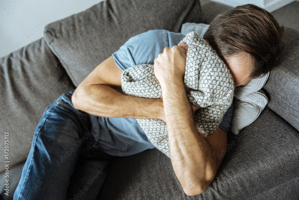 Depressed sad man being in griefb Stock Photo | Adobe Stock