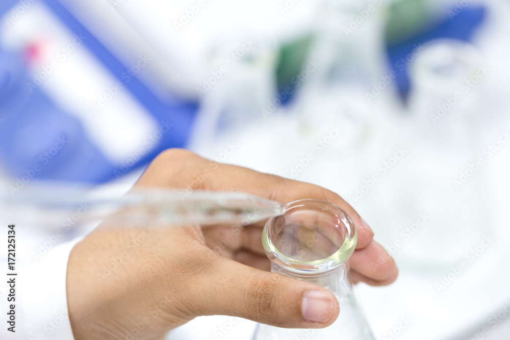 Experiment chemical solution mixing liquids on a Hotplate Stirrer in ...