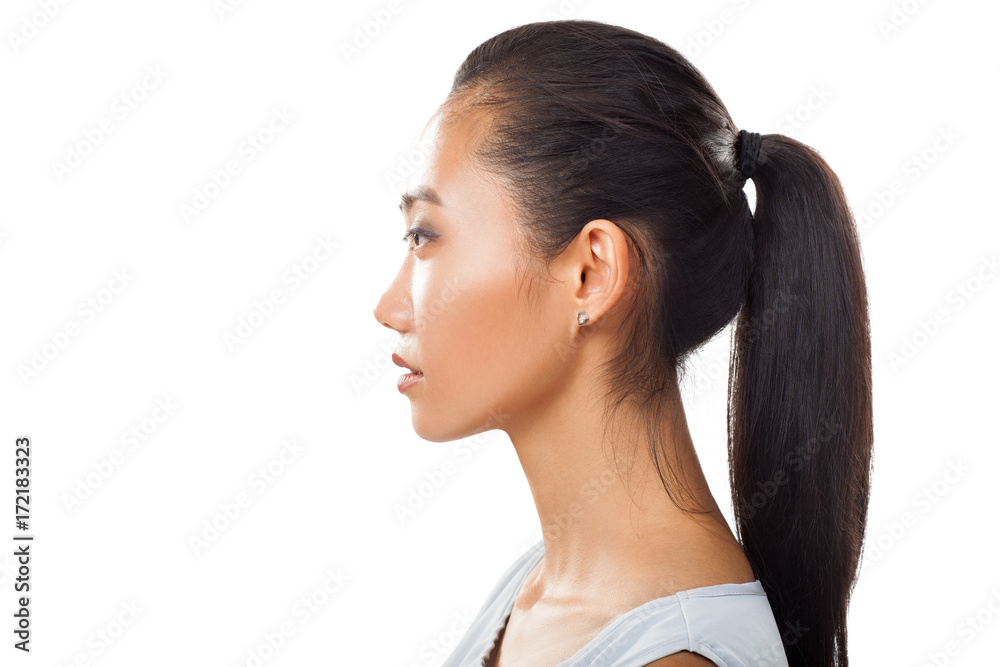 Closeup portrait of Asian young woman in profile with ponytail Stock ...