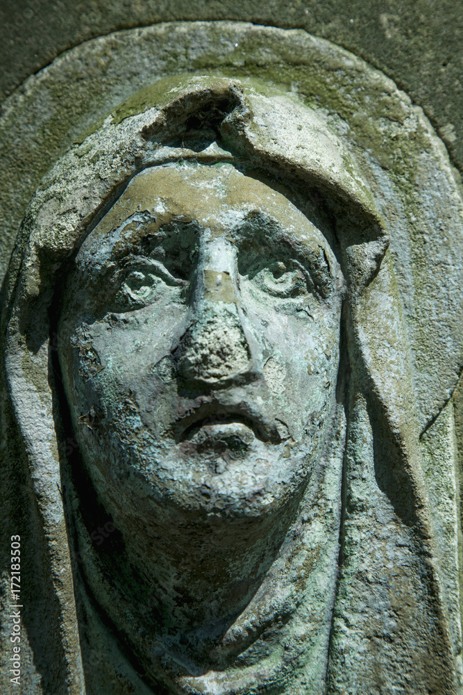 Virgin Mary statue. Vintage sculpture of sad woman in grief (Religion ...