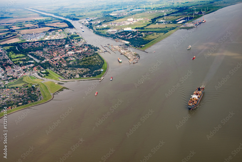 Panorama flight over the Elbe River and the west coast of Germany, with ...