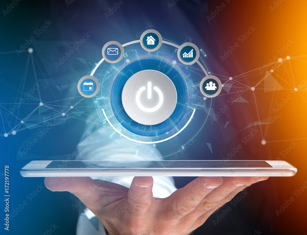 Power button symbol with computer app displayed on a futuristic ...