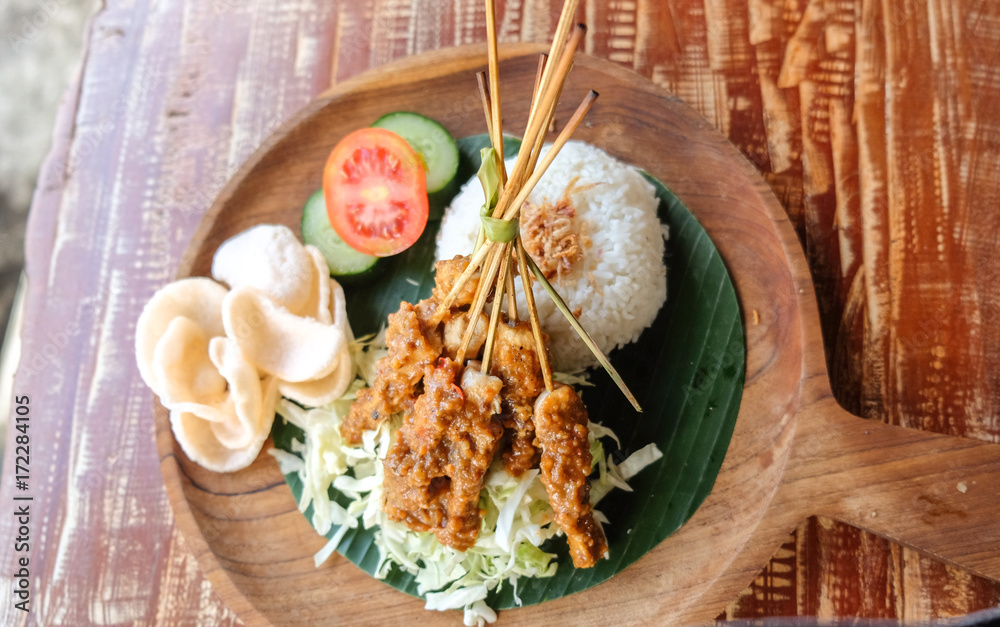 Chicken Sate rice ( Nasi sate) served eggs, prawn crackers and chicken ...