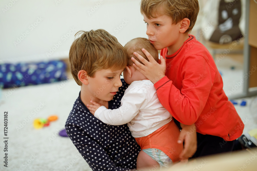 Two Little Kids Hugging