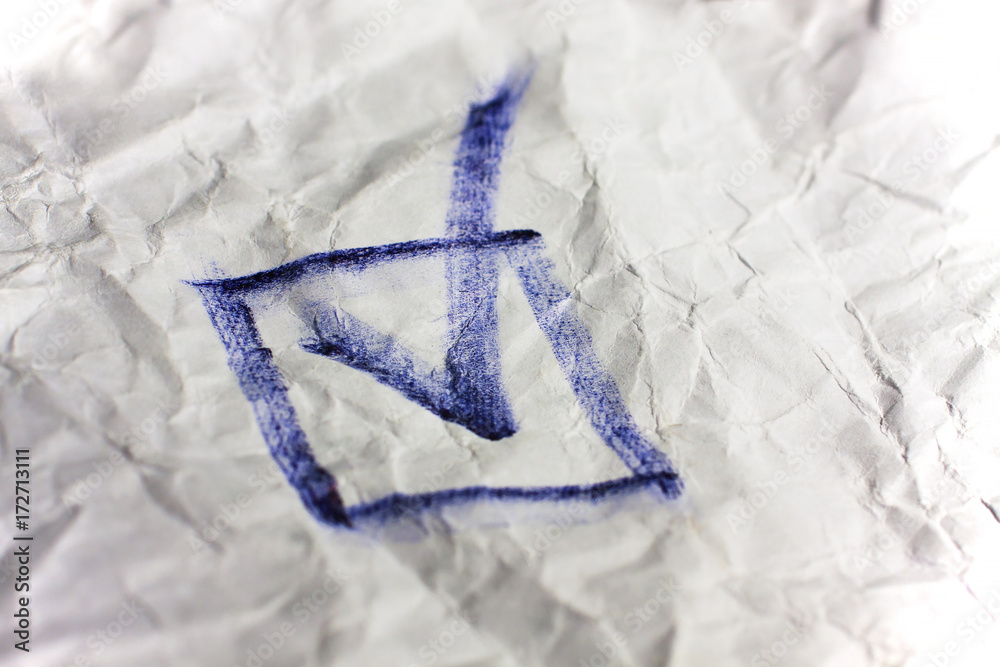 Check mark in checkbox on crumpled paper. Stock Photo | Adobe Stock