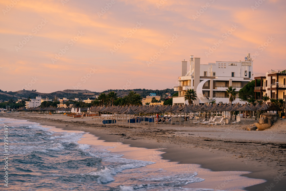 Albania. Golem. Evening beach at sunset in the resort of Golem on the ...