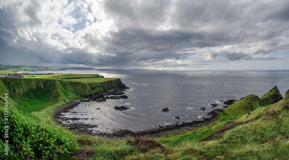 Giant's Causeway trail with a blue sky in summer, Co. Antrim, Landscape ...