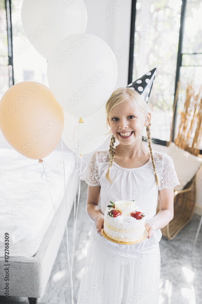 Girl Holding Birthday Cake Stock Photo | Adobe Stock