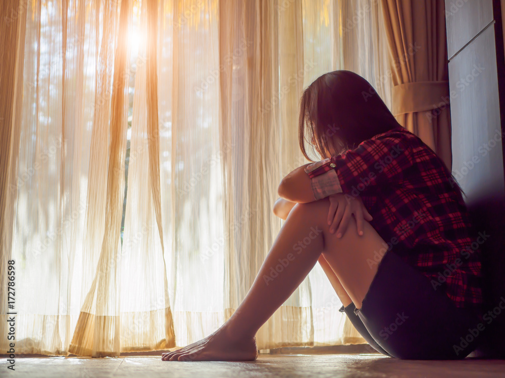 Sad Girl Sitting Down