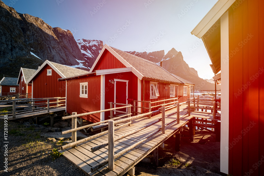 Red Classic Norwegian Rorbu fishing huts with sod roof on Lofoten ...