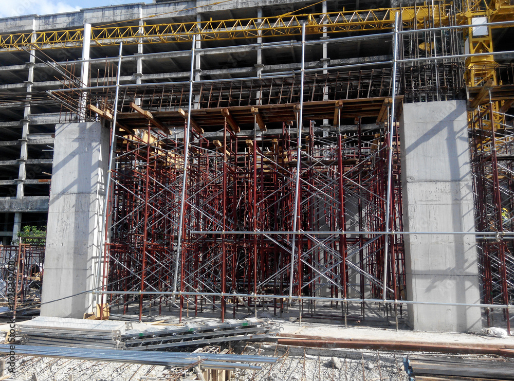 Casted concrete column at the construction site. Provided protruding ...