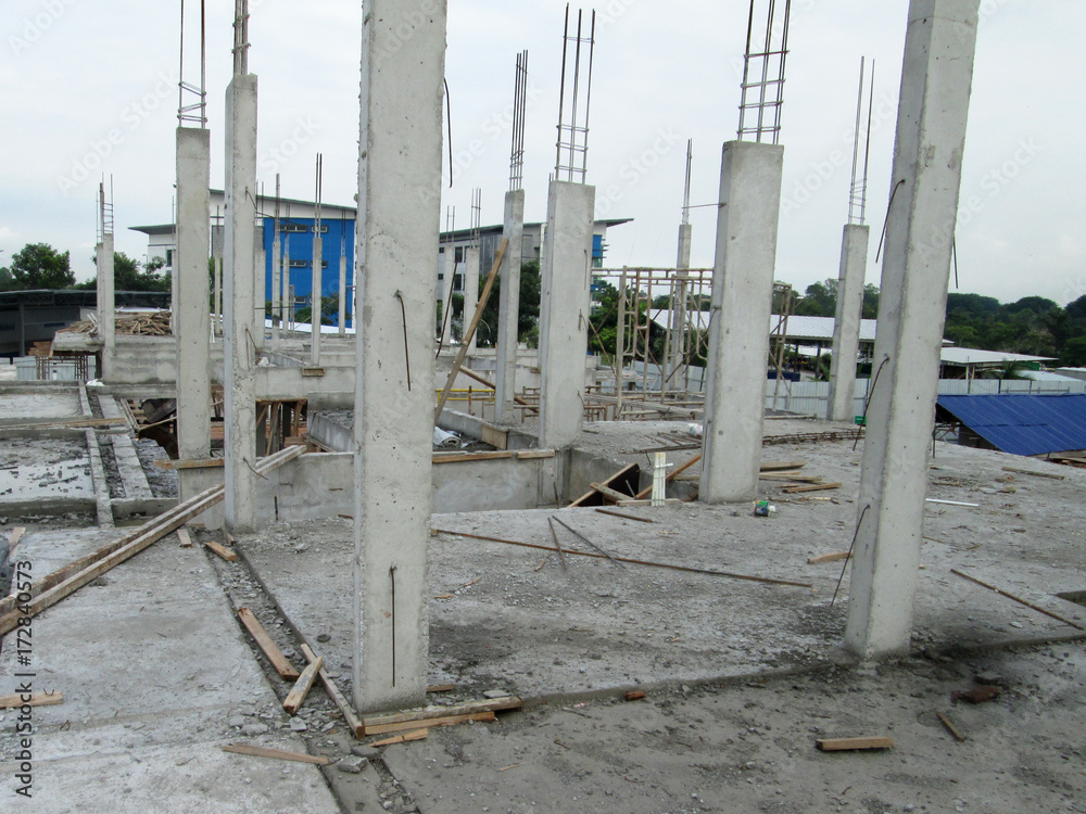 Casted concrete column at the construction site. Provided protruding ...