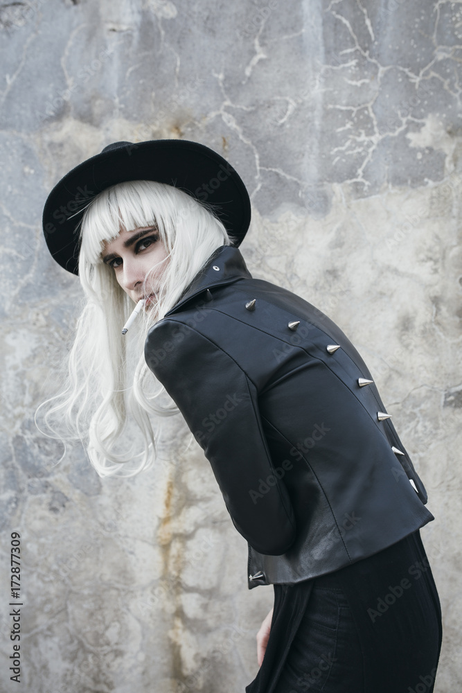 Alternative androgen model with grey hair on a rooftop Stock Photo ...