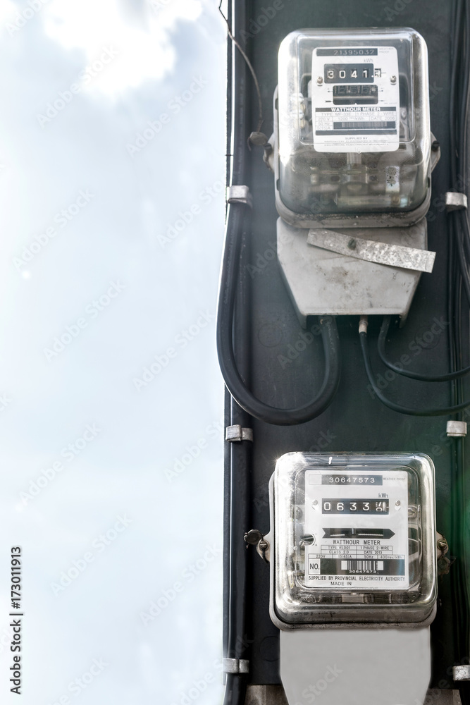 Power meter is attached to a power pole used to measure the light ...