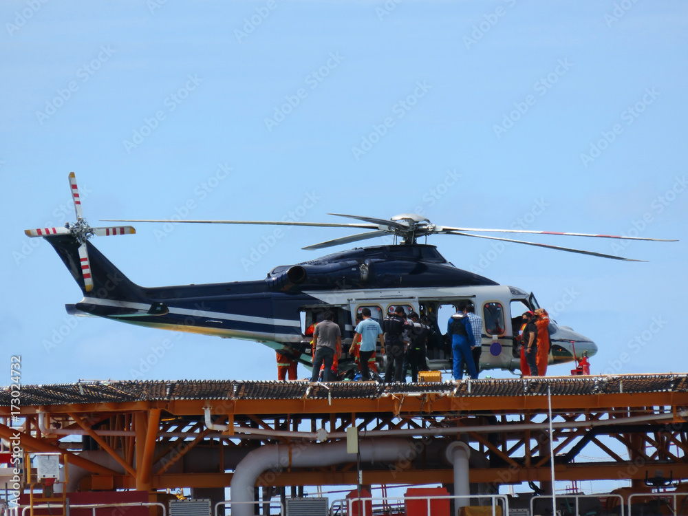 Poster Helicopter or chopper land at oil and gas platform area for get ...