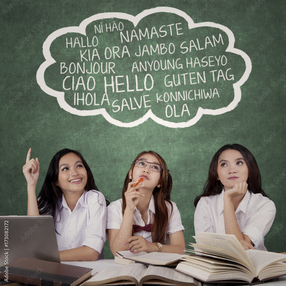 Female students learn different languages Stock Photo | Adobe Stock