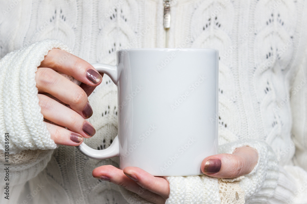 Woman holds white mug in hands. Design Mockup for winter holidays Stock ...